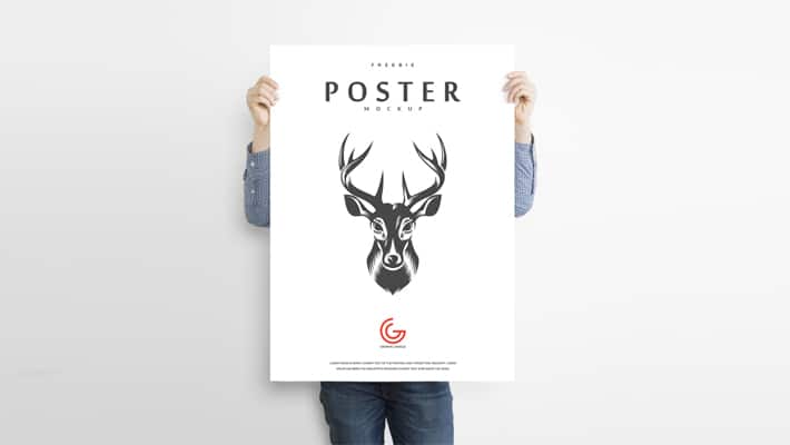 Free Man Holding Advertisement Poster Mockup PSD » CSS Author
