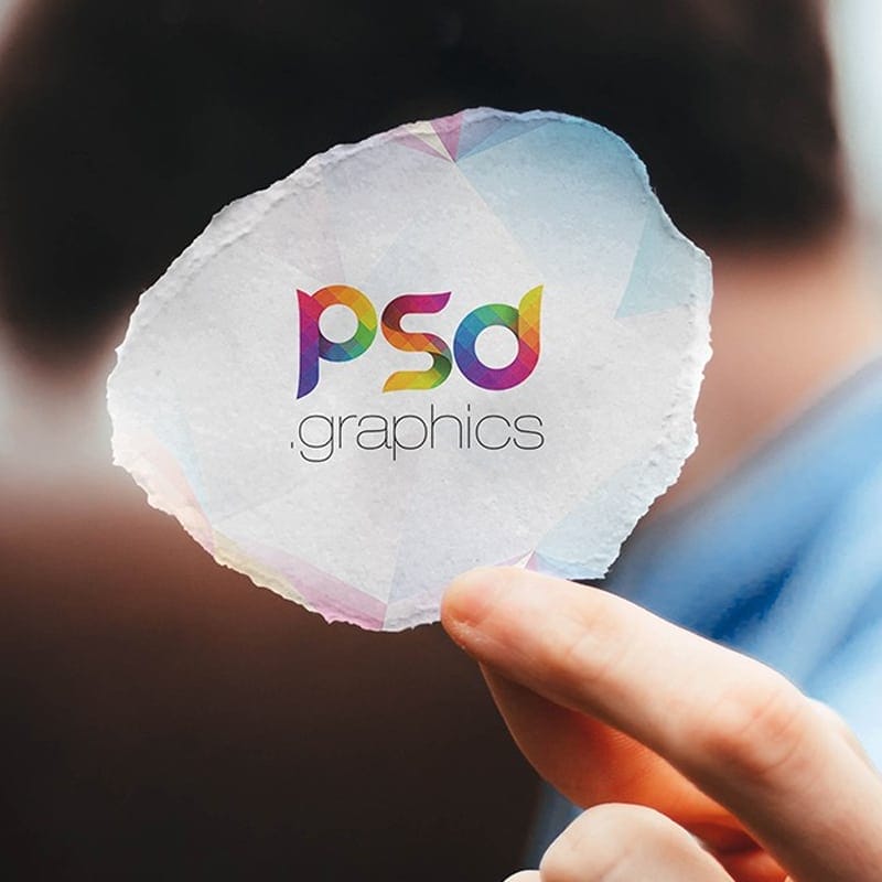 Man Holding Torn Piece Of Paper Mockup » CSS Author