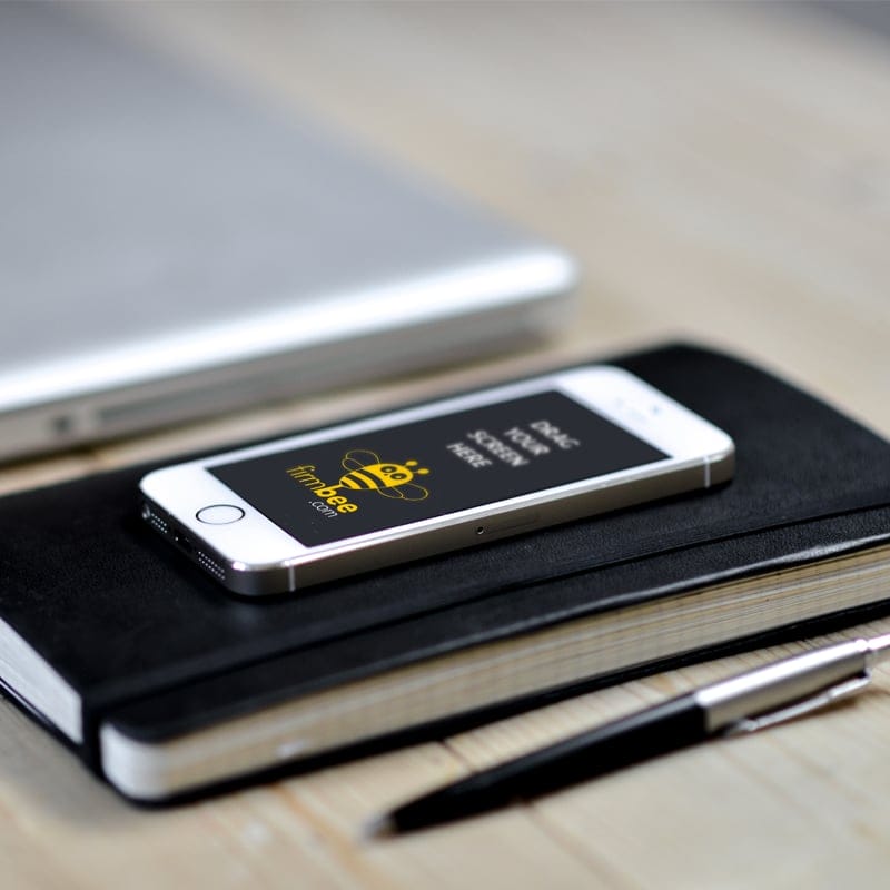 Apple IPhone 5 Lying On A Notebook PSD Mockup » CSS Author