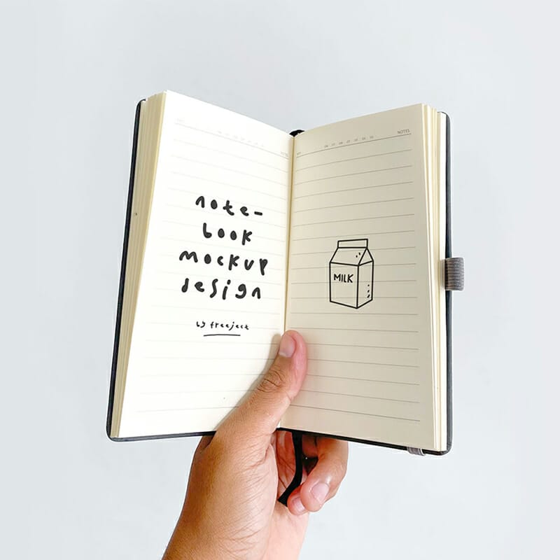 Free Hand Held Notebook Mockup Design » CSS Author