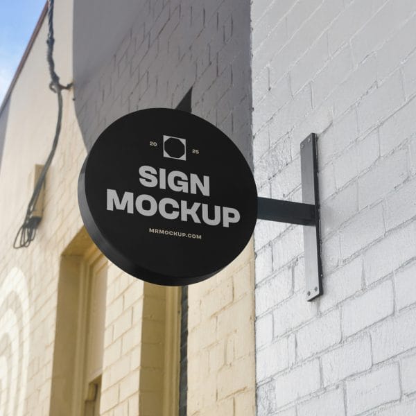 Free Circle Signage Attached To Wall Mockup PSD