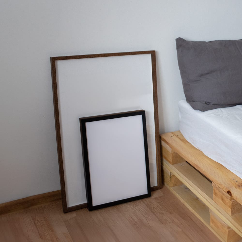 Free A2 And A4 Leaning Frames Bedroom Mockup PSD